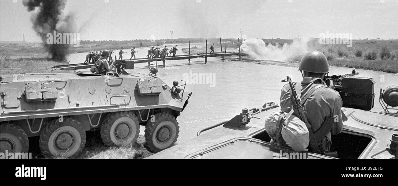 Motorized Rifle blazing away with machineguns Military exercise Stock ...