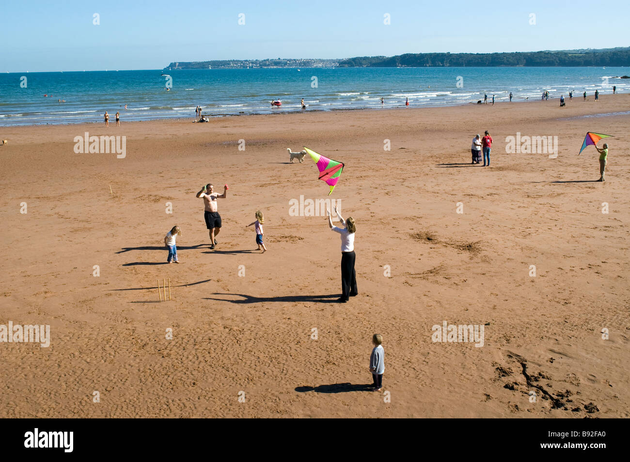 Families flying kites on Goodrington beach Torquay,Torbay,color, colour ...