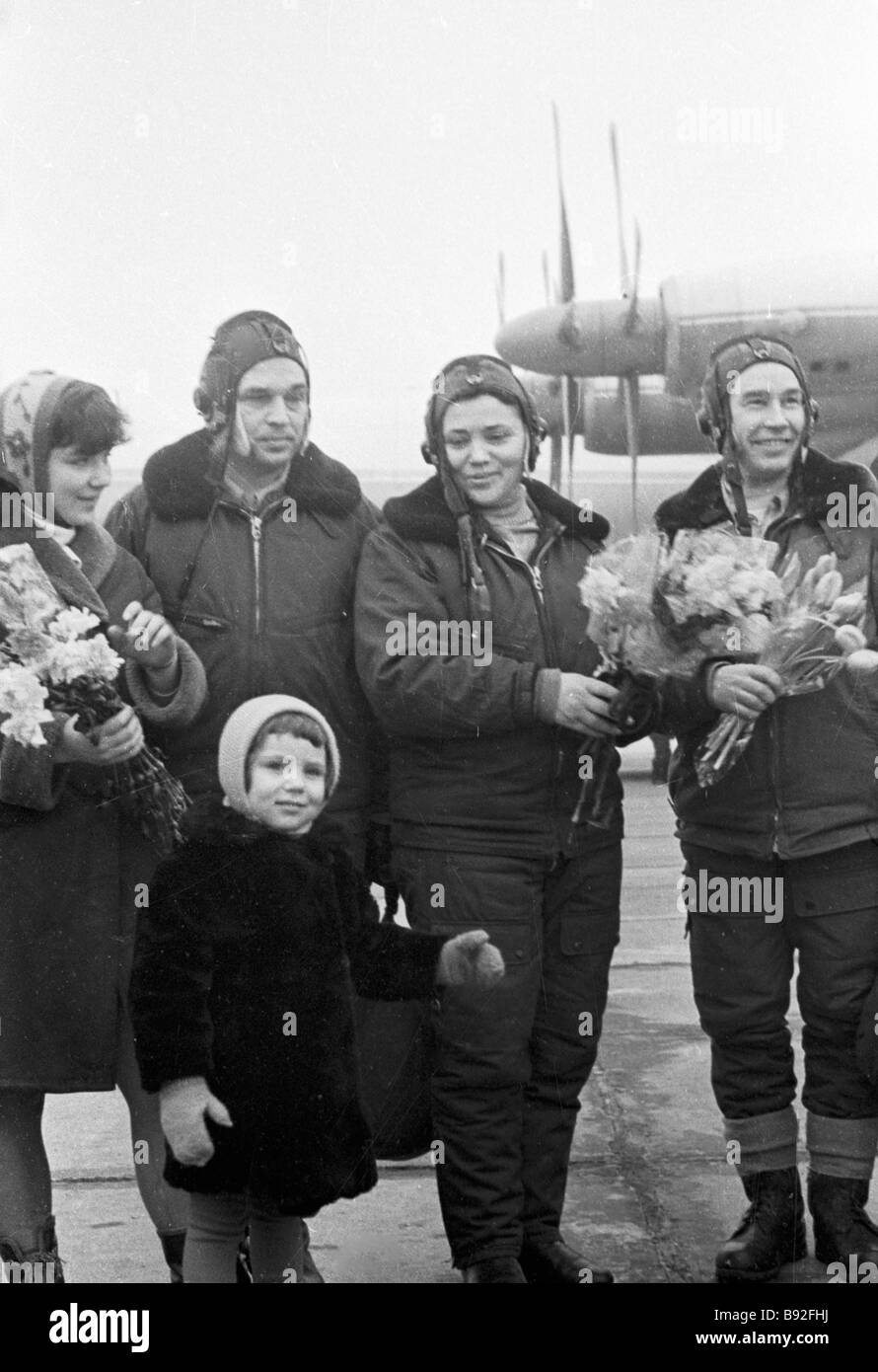 Pilot Marina Popovich second right with daughters and crewmen after a ...
