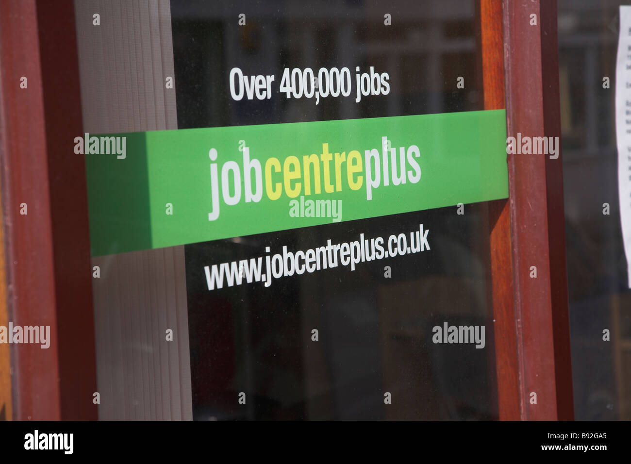 Job centre sign on glass window Stock Photo - Alamy