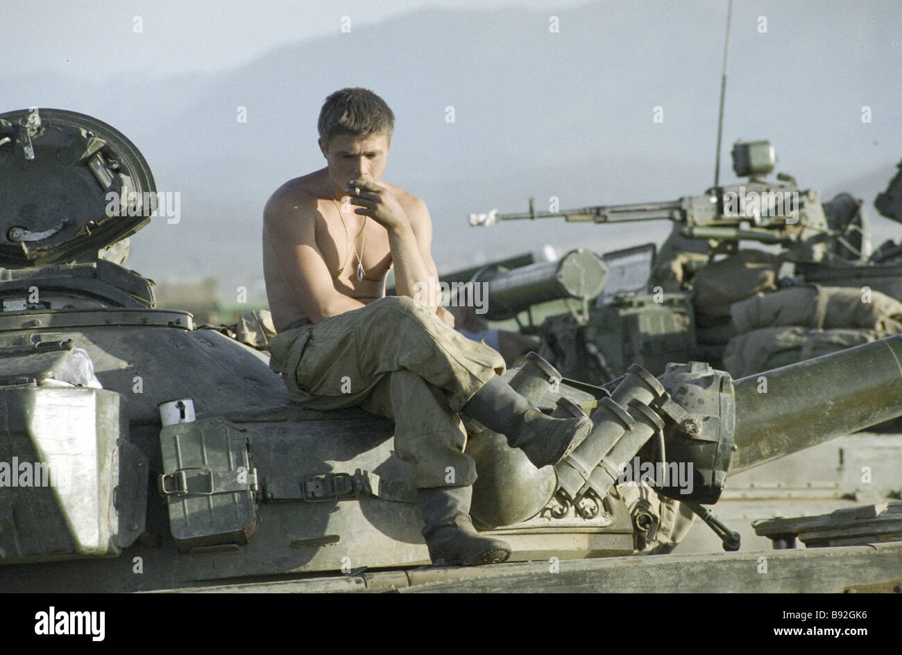 A soldier from federal troops smoking on a tank Stock Photo - Alamy