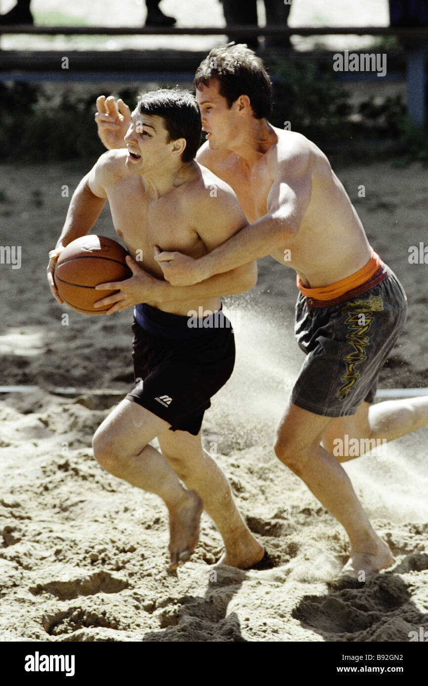 Men competing in world open rag ball championship during world beach ...