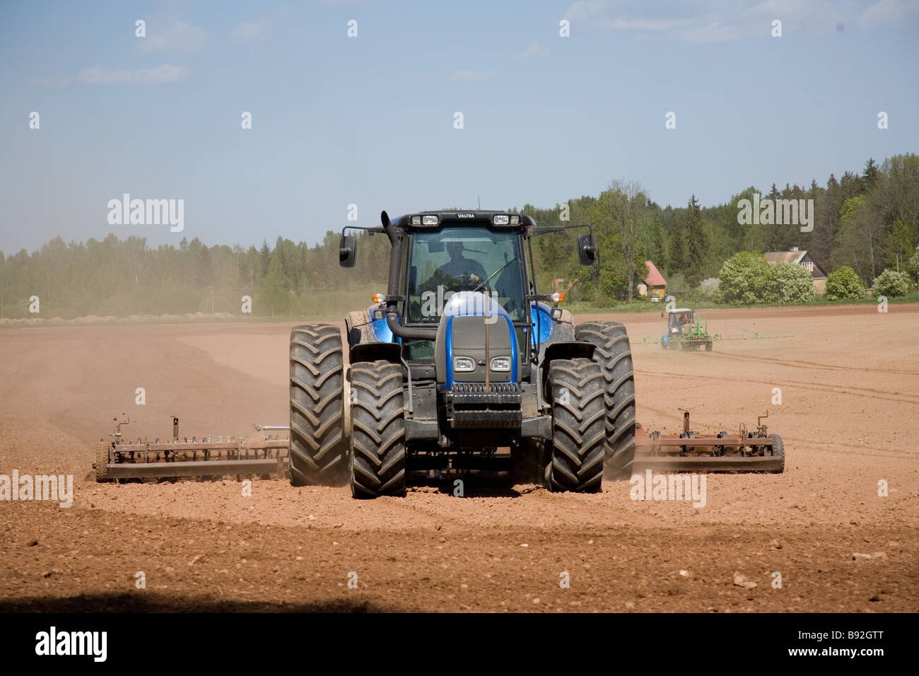Tractor laboring hi-res stock photography and images - Alamy