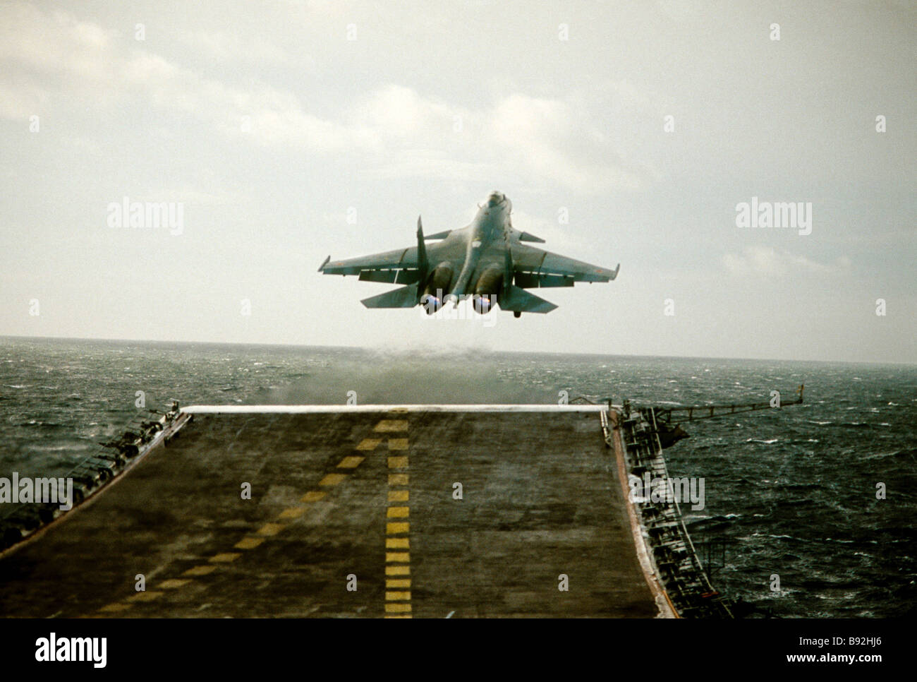 Sukhoi Su 27 K Flanker supersonic deck fighter takes off from aircraft ...