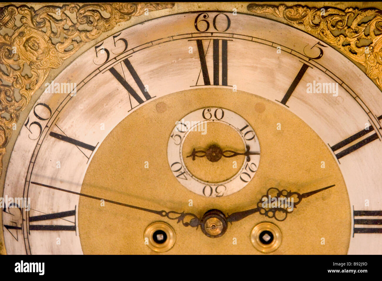 Close up detail of part of antique clock face Stock Photo - Alamy