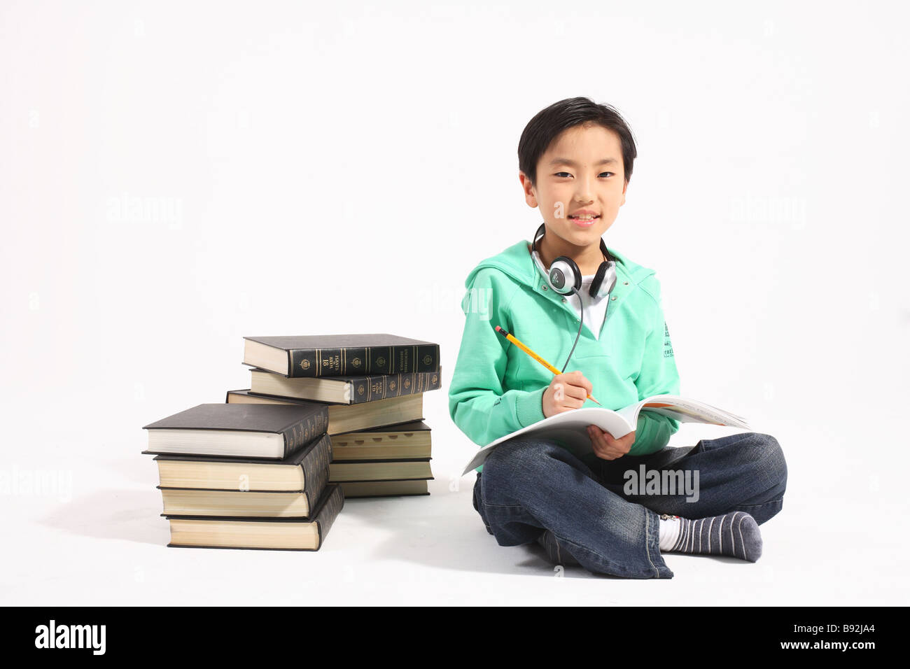 Young Child in Study Stock Photo - Alamy
