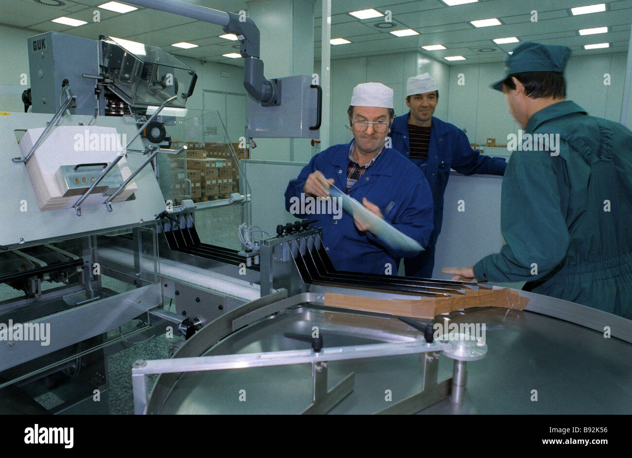 Employees of the Ferein pharmaceutical factory in the shop where ...