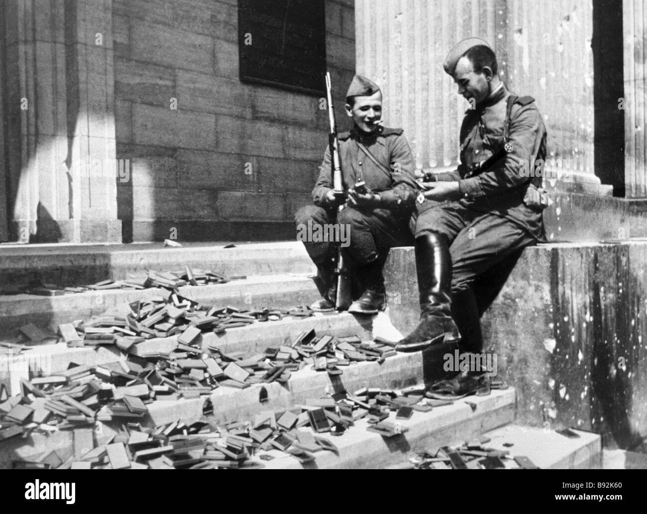 Soviet warriors sitting on the staircase of the Imperial Chancellery ...