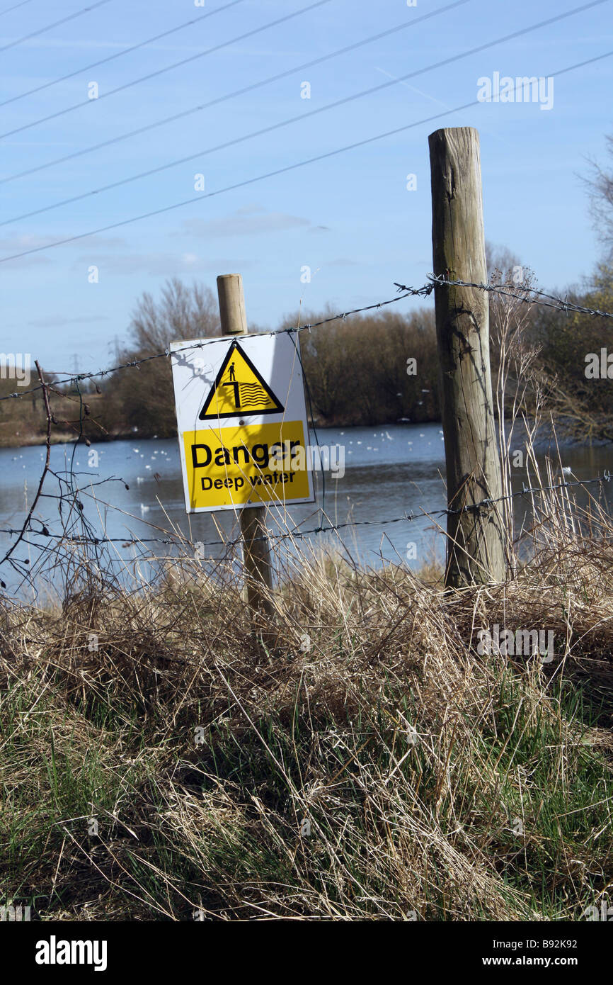 Hazard warning sign Stock Photo - Alamy