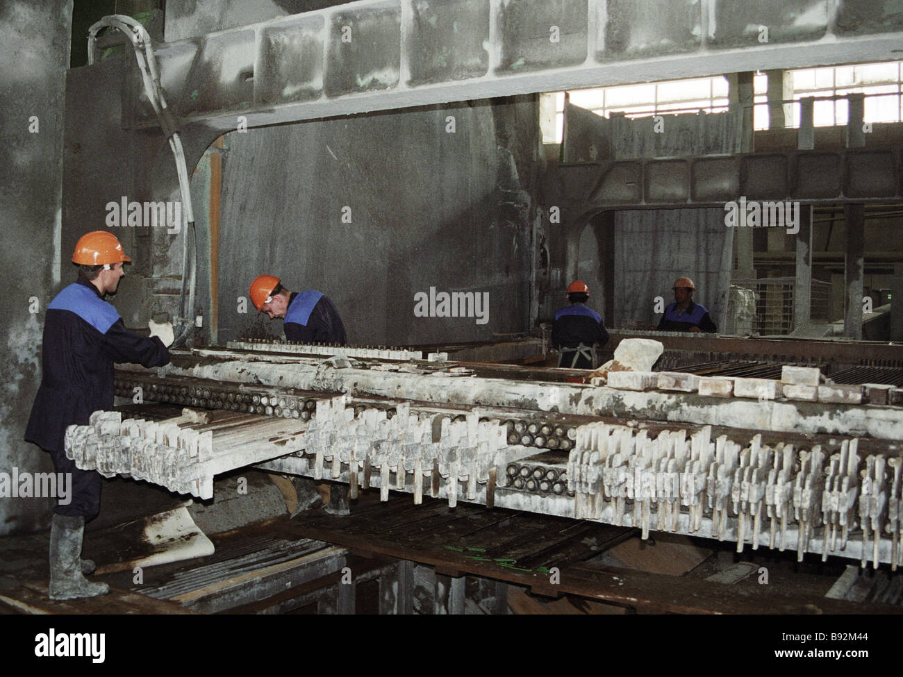 Workers of the stone processing plant Stock Photo - Alamy