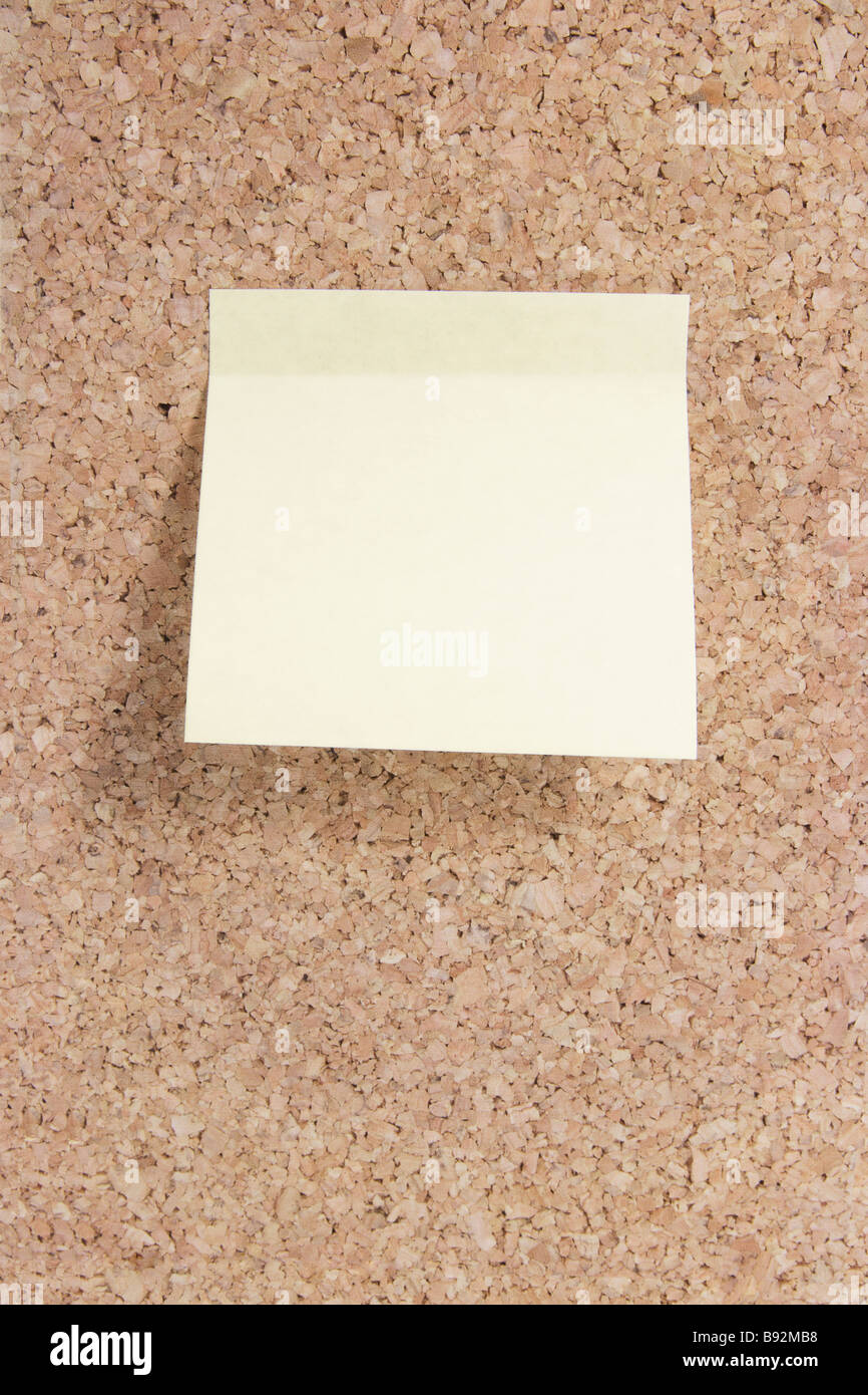 Post-It Note on Bulletin Board Stock Photo - Alamy