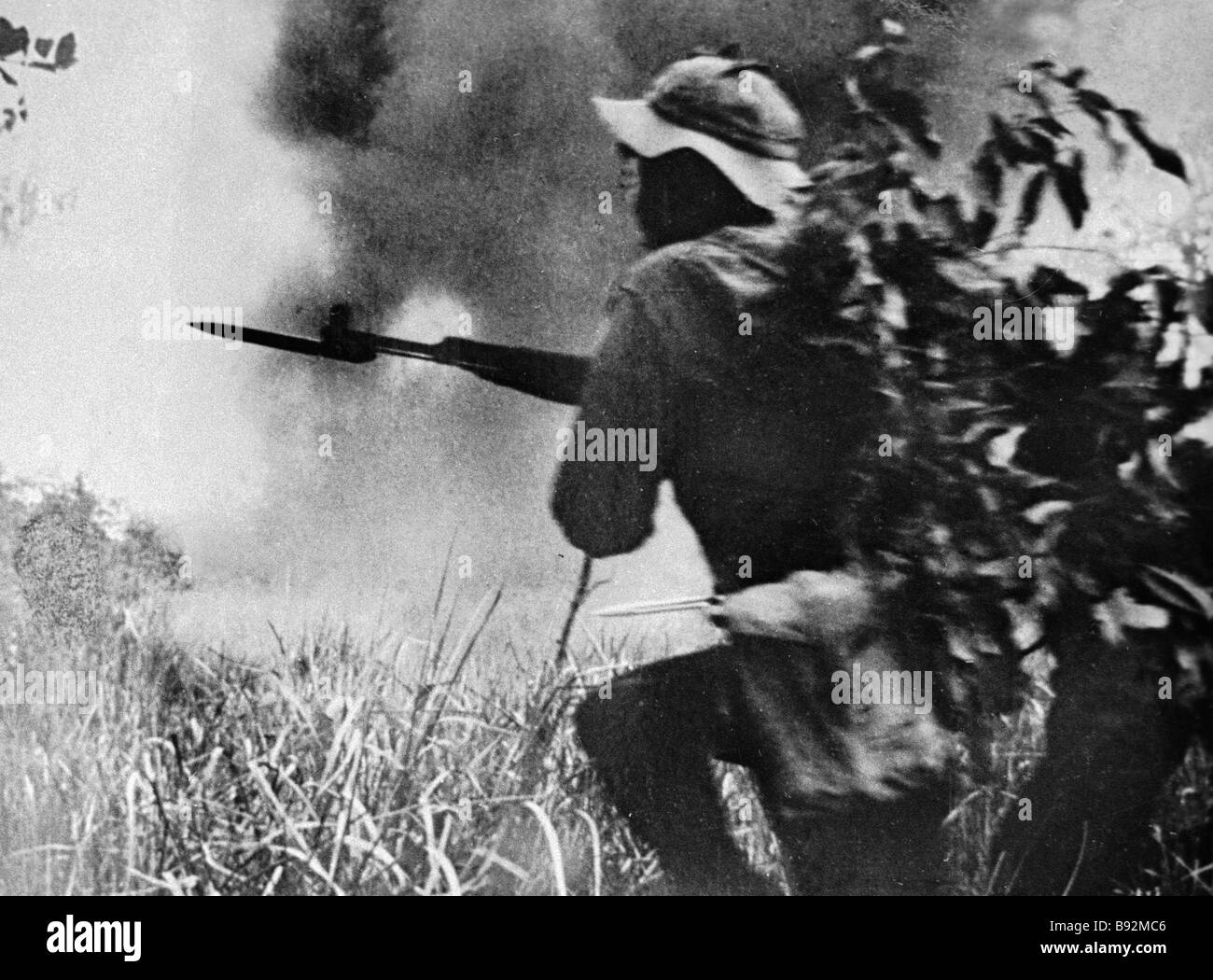 A soldier from a South Vietnamese guerilla unit during a combat ...