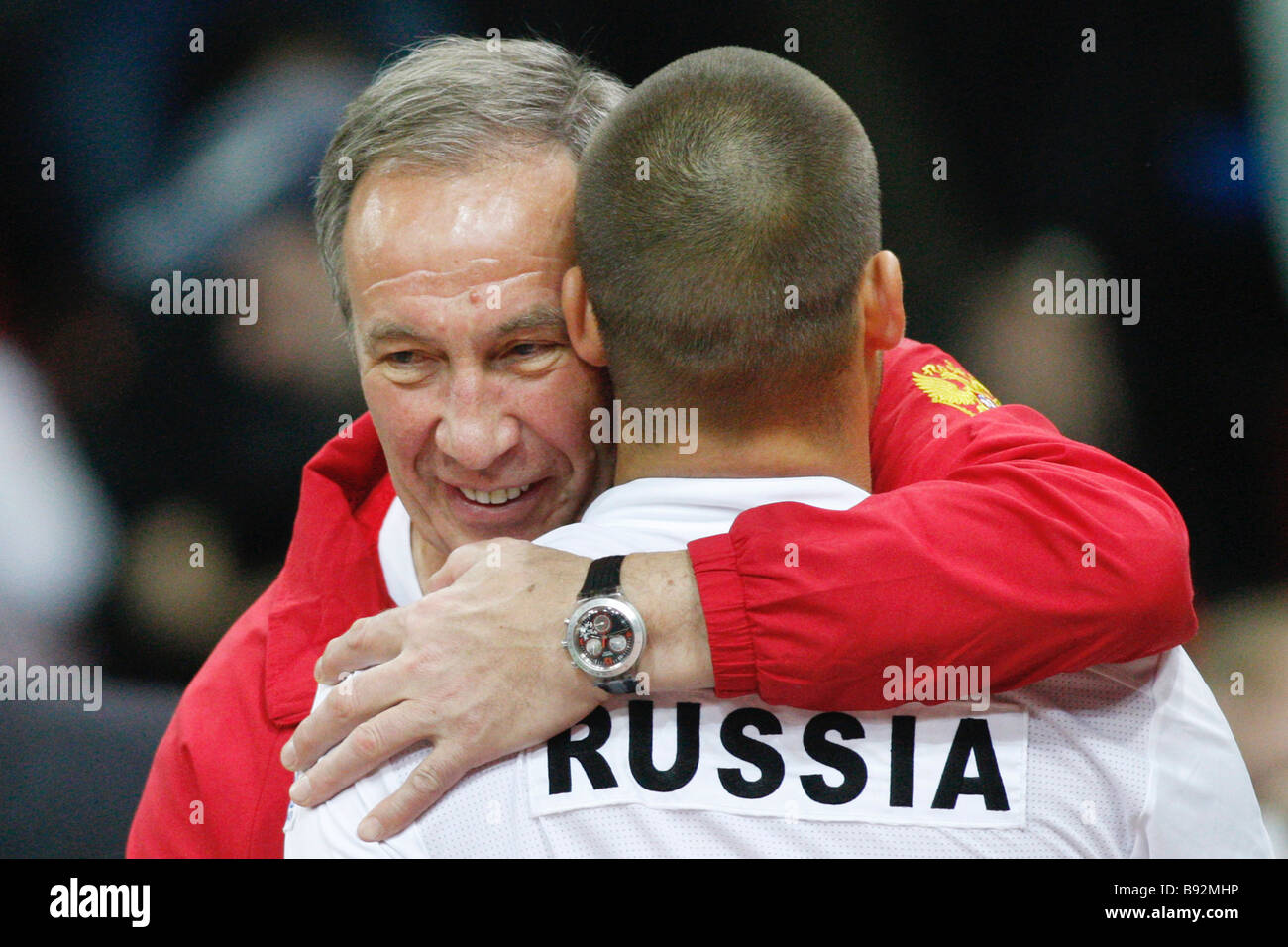 Russian tennis team coach Shamil Tarpischev left congratulating Mikhail ...