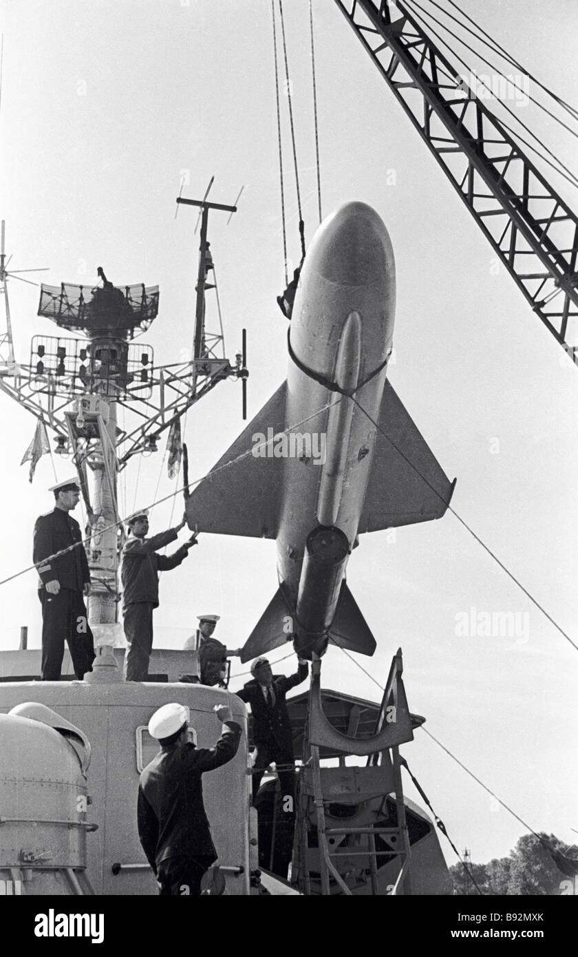 Loading a missile onto a missile boat Stock Photo - Alamy