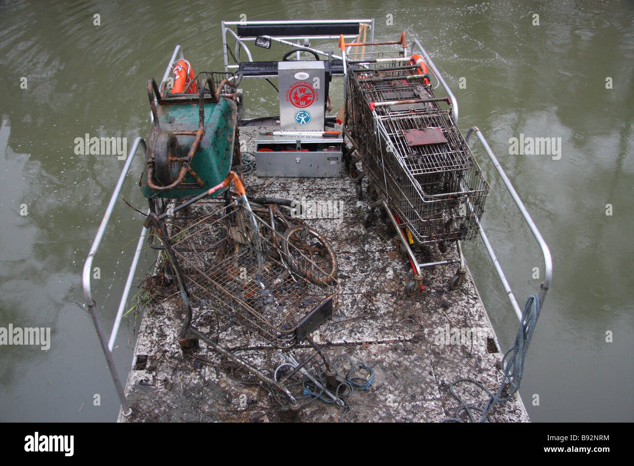 river debris rubbish dredged from bed floor supermarket trolleys ...