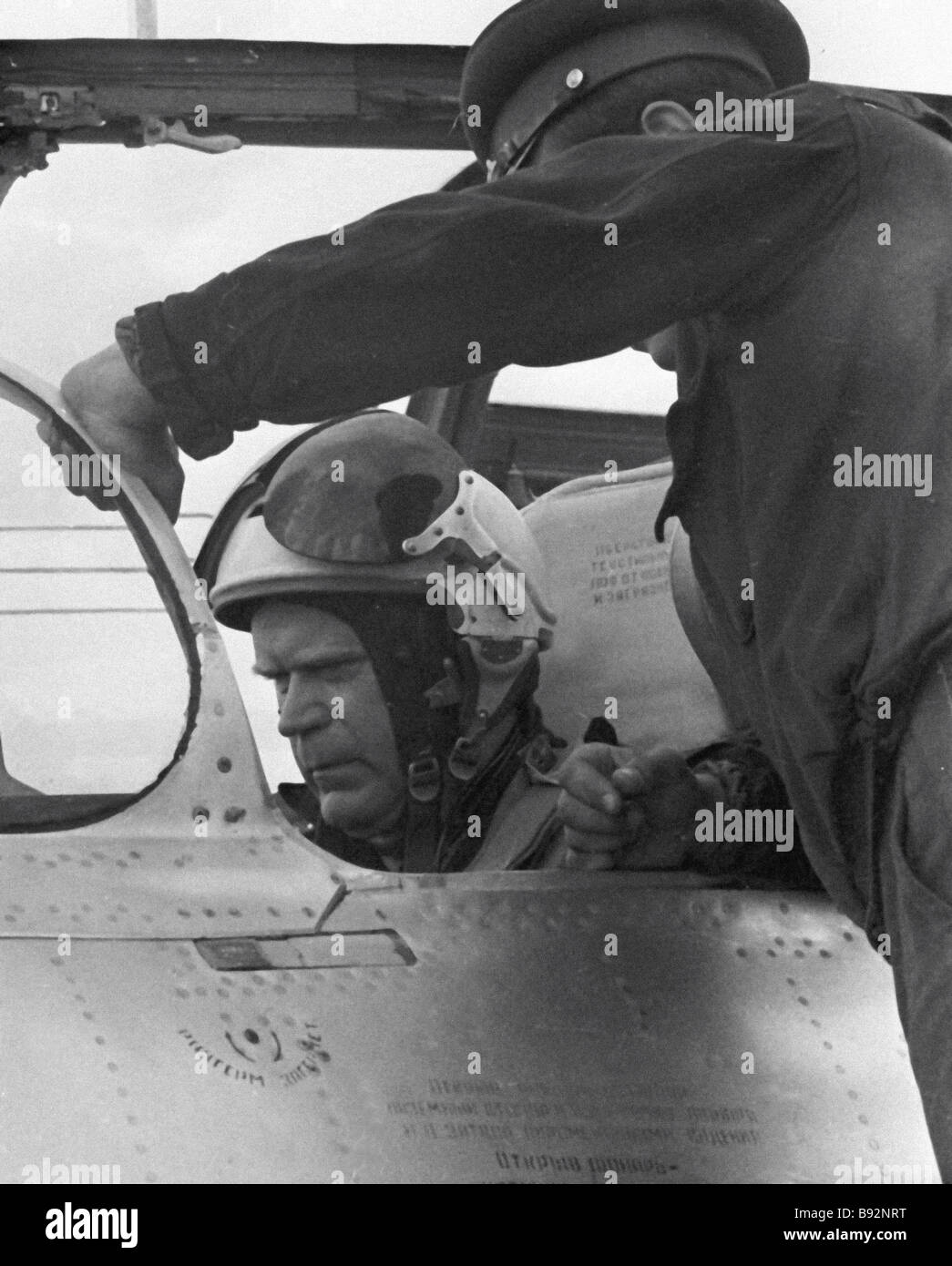A merited Soviet pilot Colonel Alexei Zuzin gets ready for the flight ...