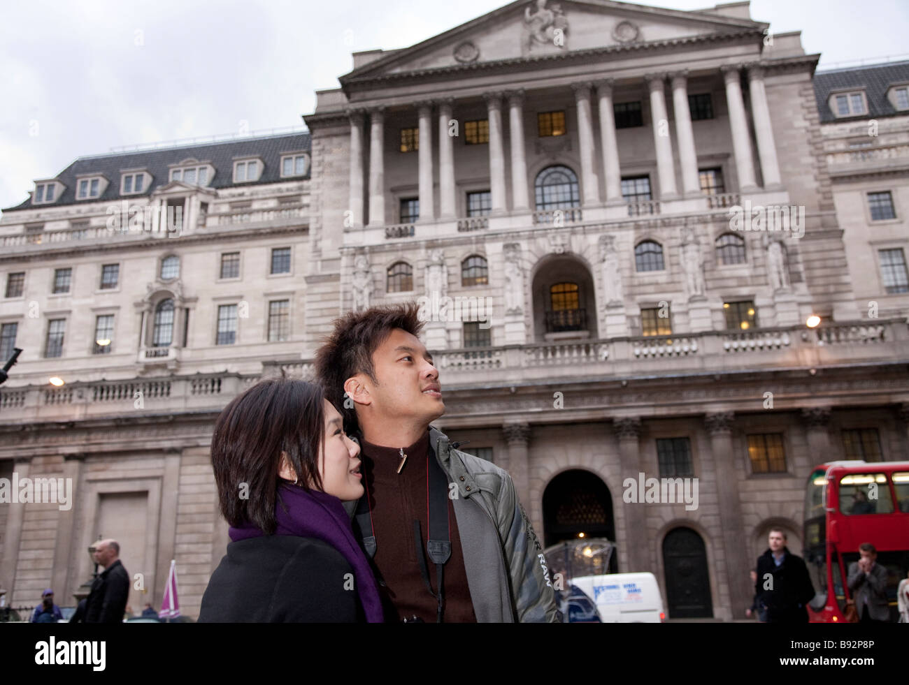 Asian oriental tourist couple in 20s / 30s visiting London, outside of ...