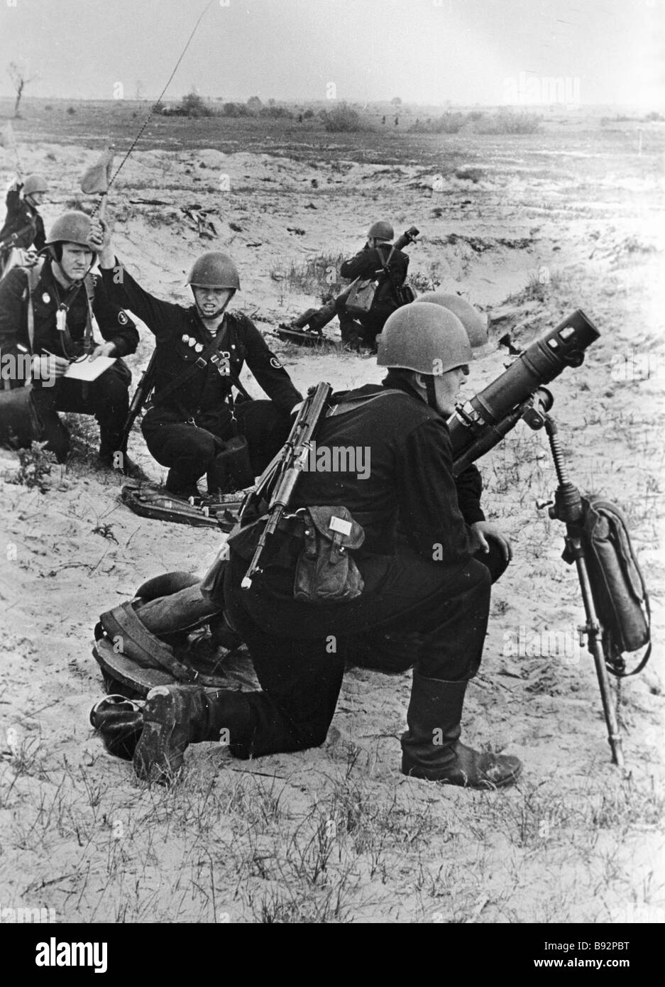 Mortar gunner occupying the firing position Stock Photo - Alamy