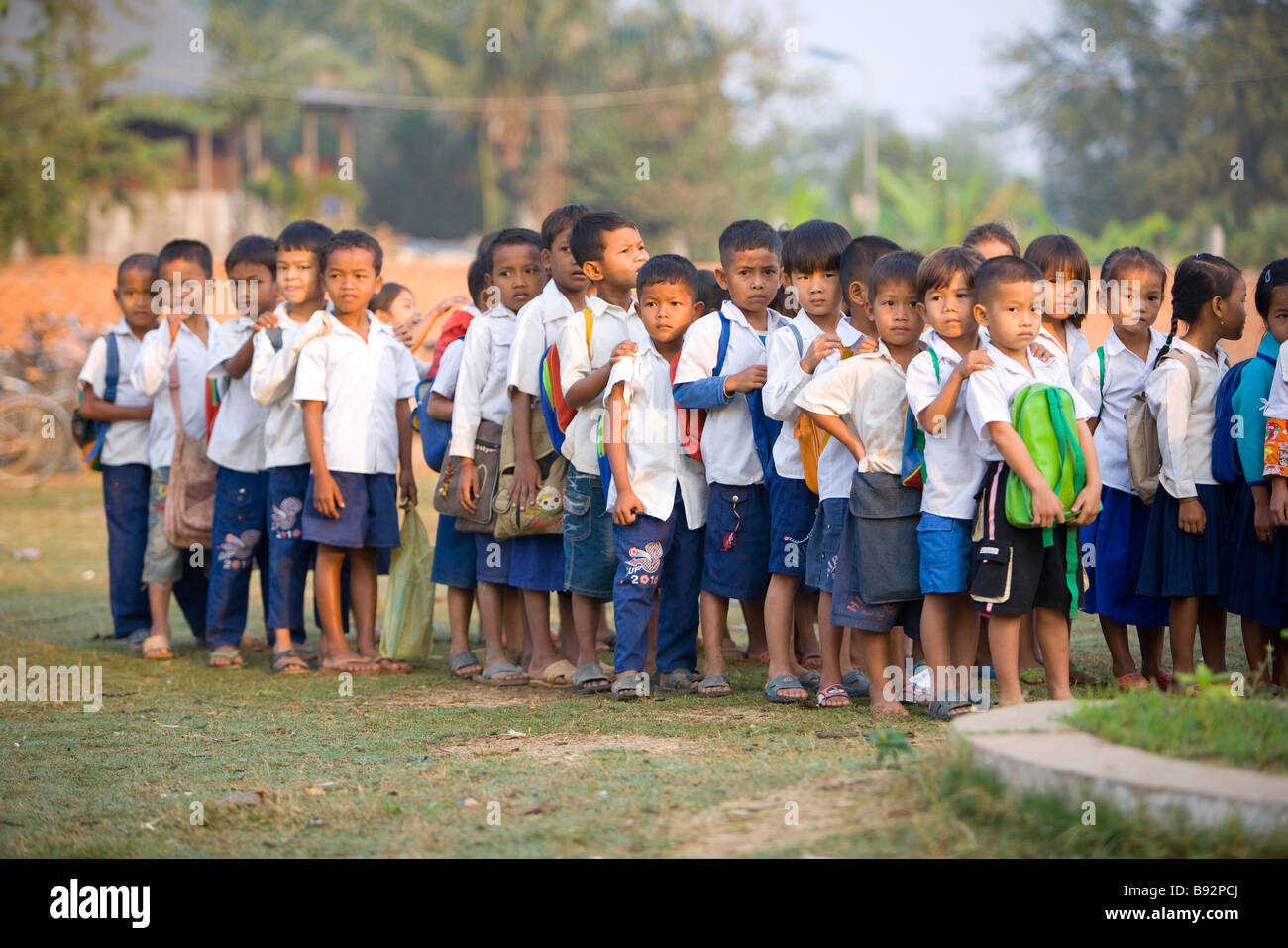 Young Cambodian children line up for class at Roesey Chroy Secondary ...