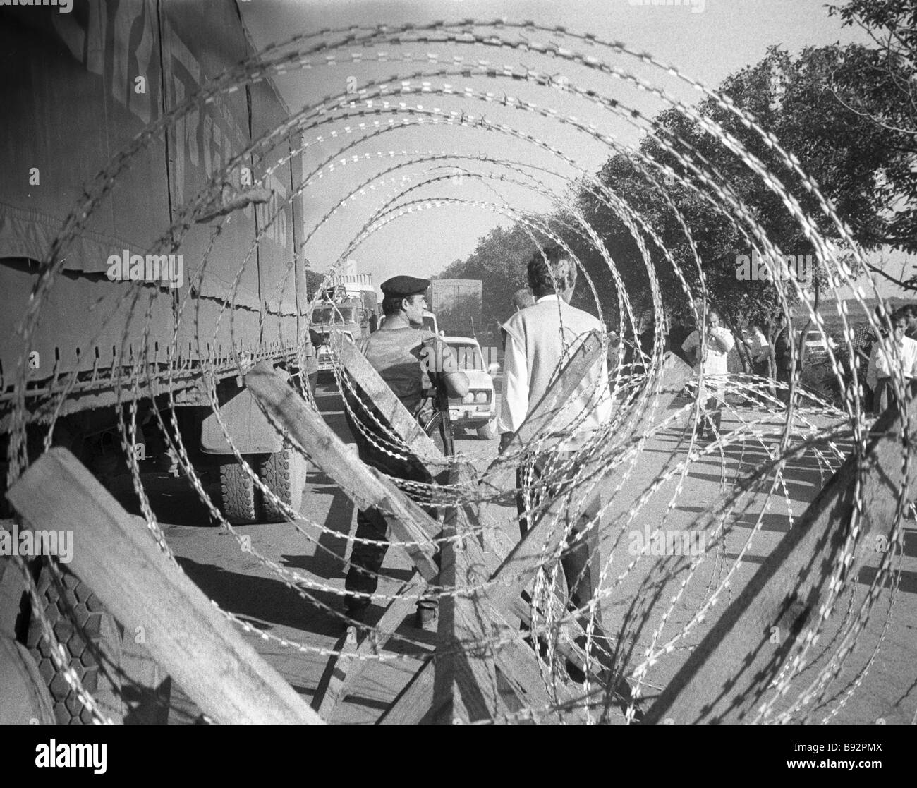 Barbed wire obstacles at checkpoint on Chechen Ingush border Stock ...