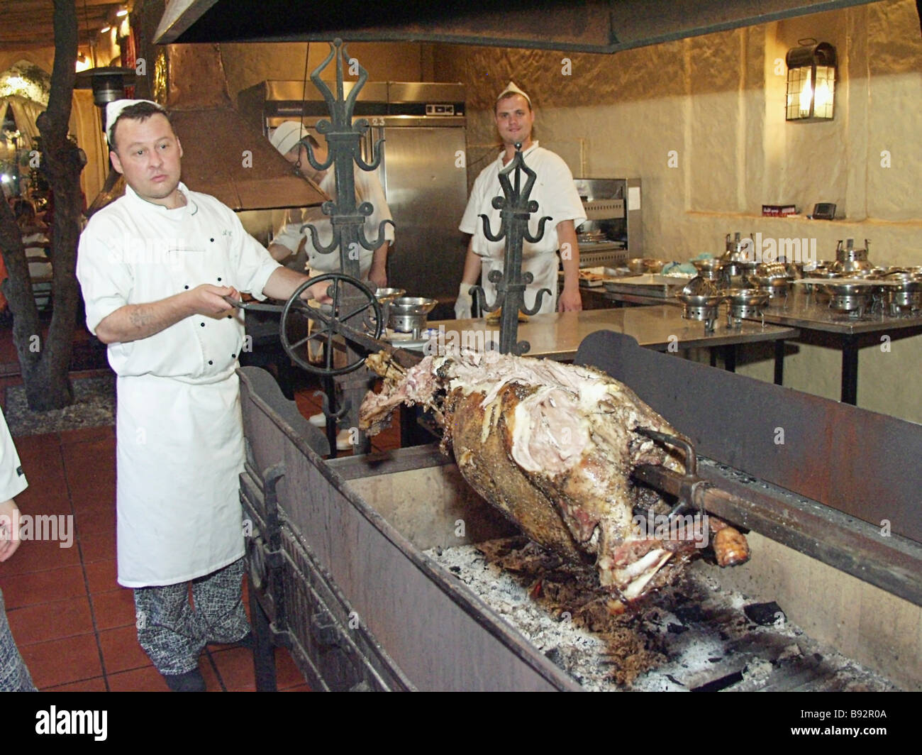 Grilling mutton in the Uzbekistan restaurant kitchen in Moscow Stock ...