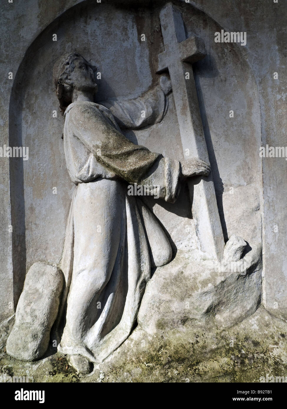 Figure with Cross Stock Photo - Alamy