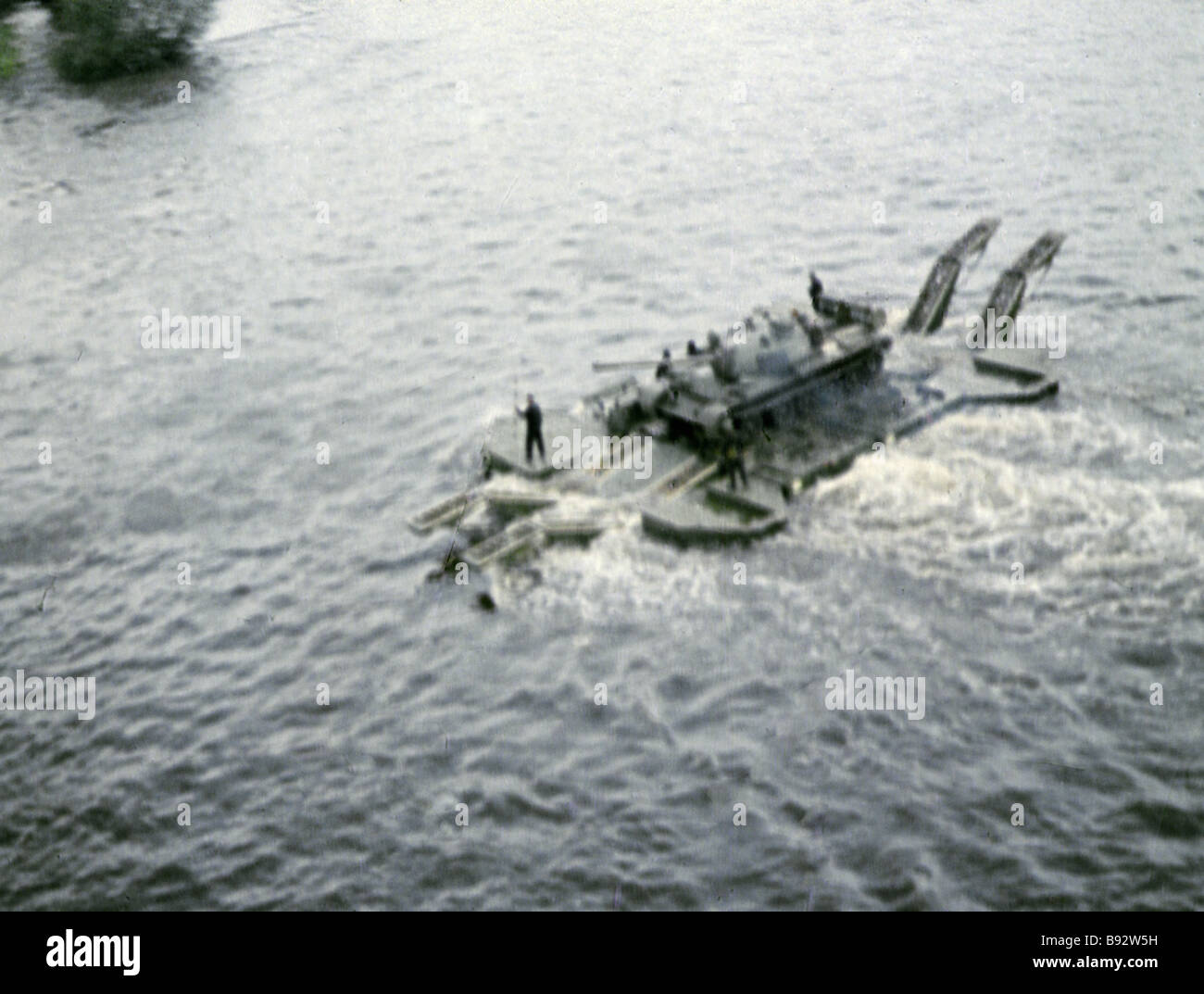 Transportation of a tank on a self propelled pontoon Stock Photo - Alamy