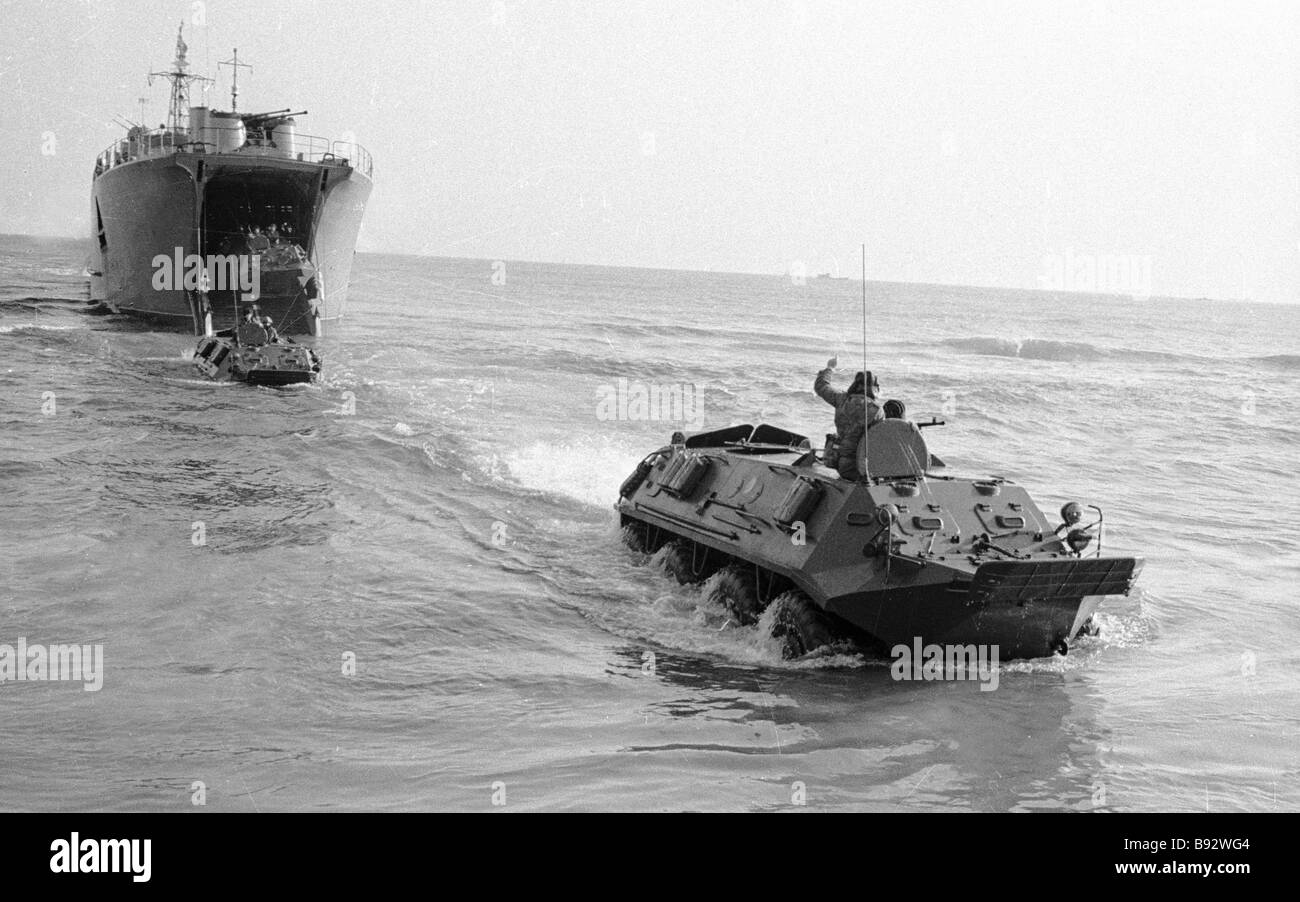 The Marines on armored personnel carriers disembark from a landing ...