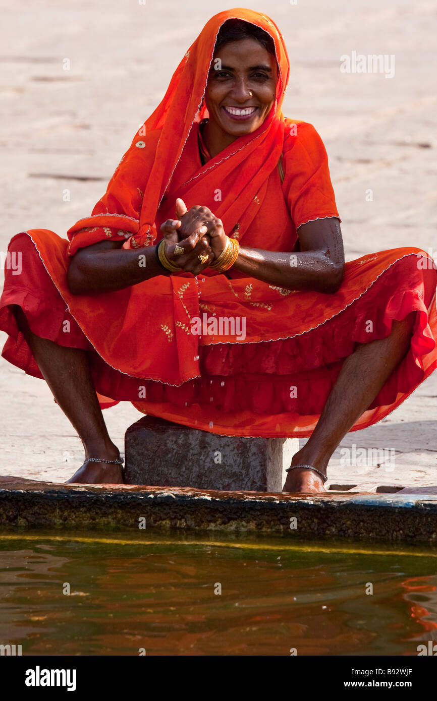 Indian Woman Washing at the Ablution Pool Inside the Friday Mosque in ...
