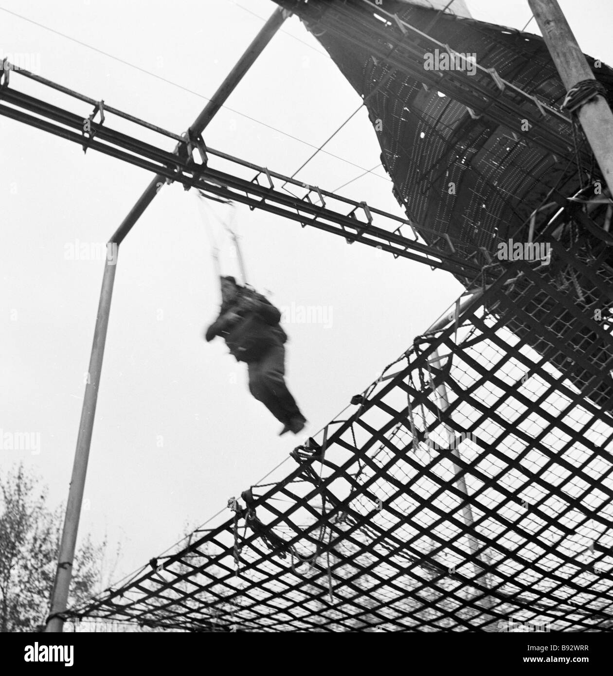 A paratrooper trains on a parachute jump simulator Stock Photo - Alamy