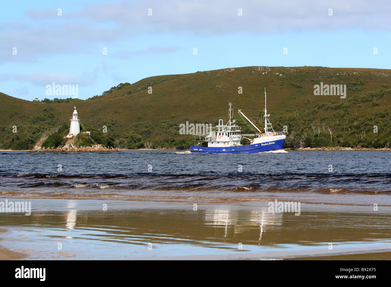 Fishing Trawler Heading Out to Sea Stock Photo - Alamy