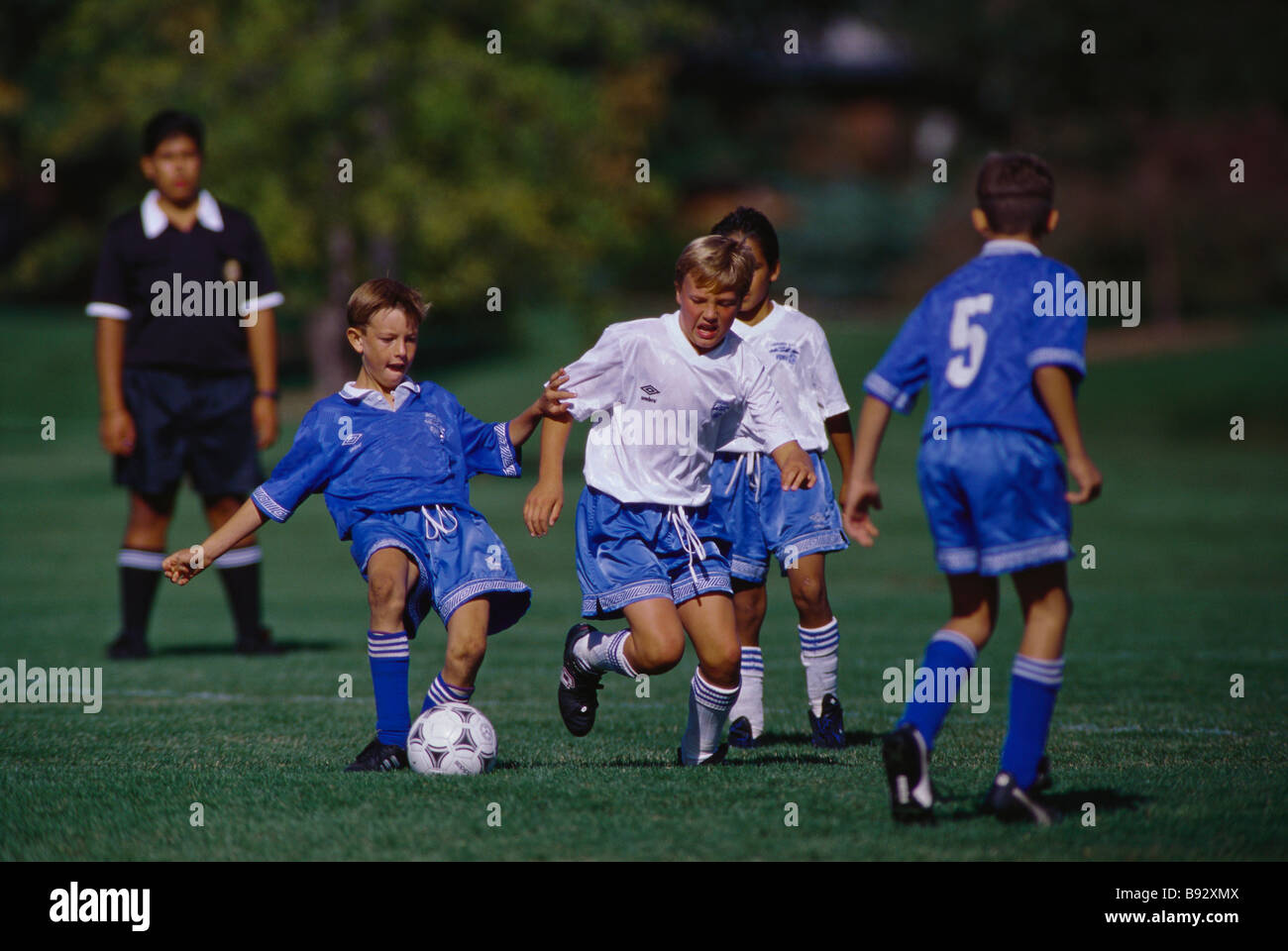 11 year old boys soccer action Stock Photo - Alamy