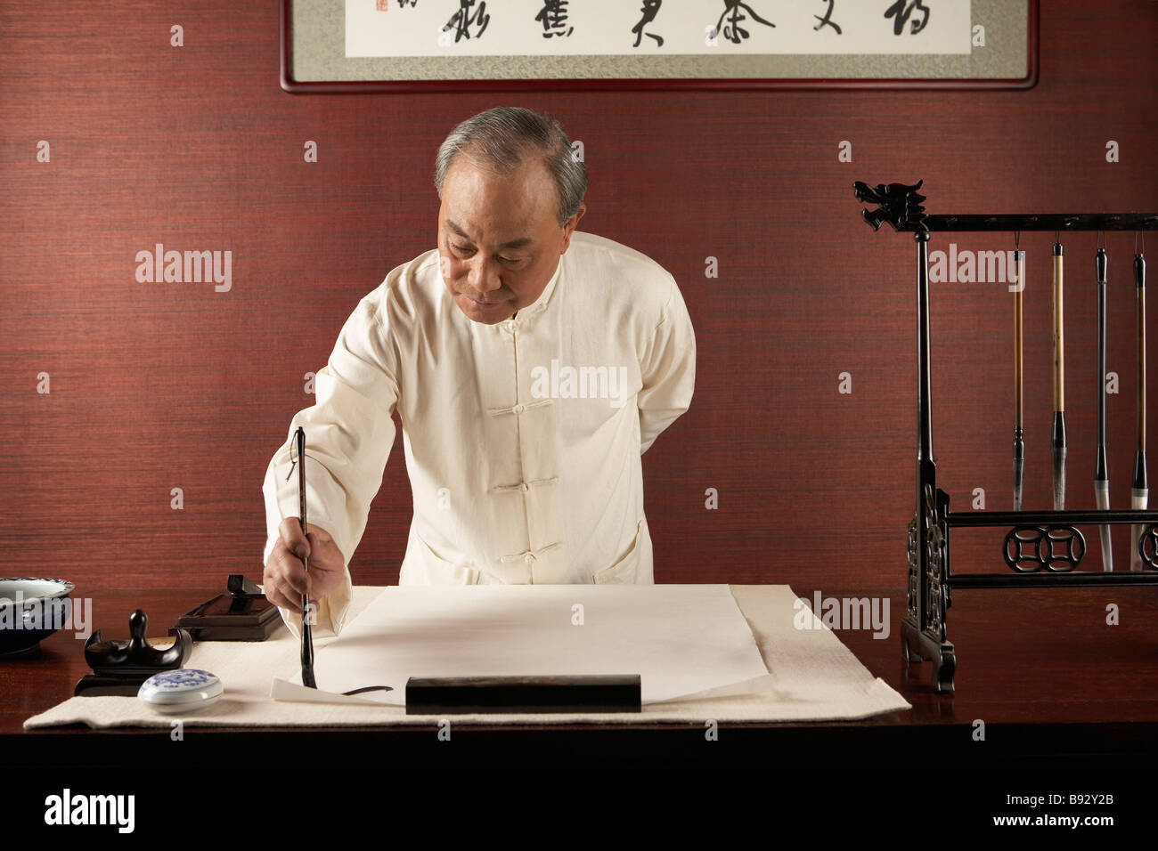 Elderly man practicing calligraphy hi-res stock photography and images ...