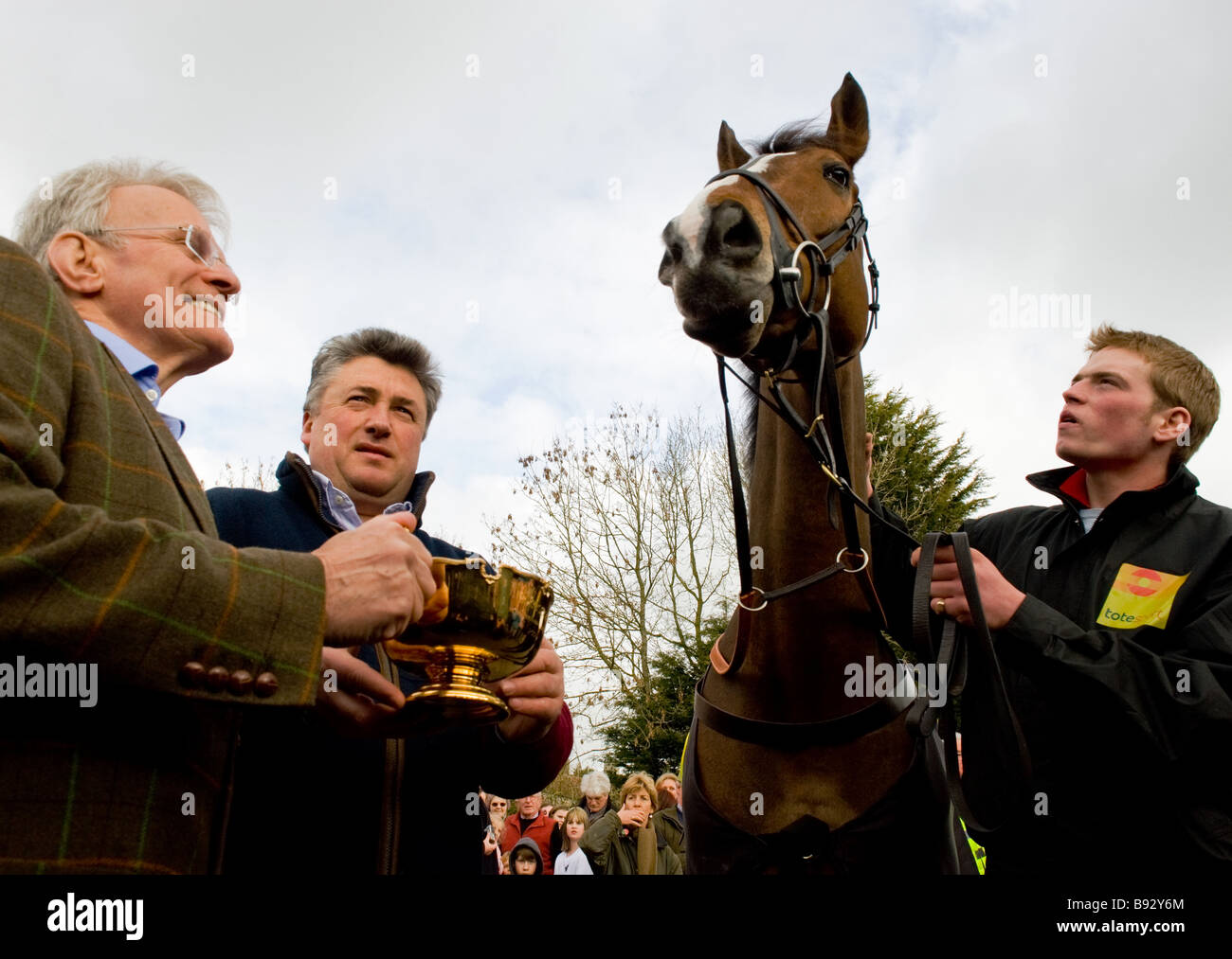 "Kauto Star" with owner Clive Smith (left) trainer Paul Nicholls ...