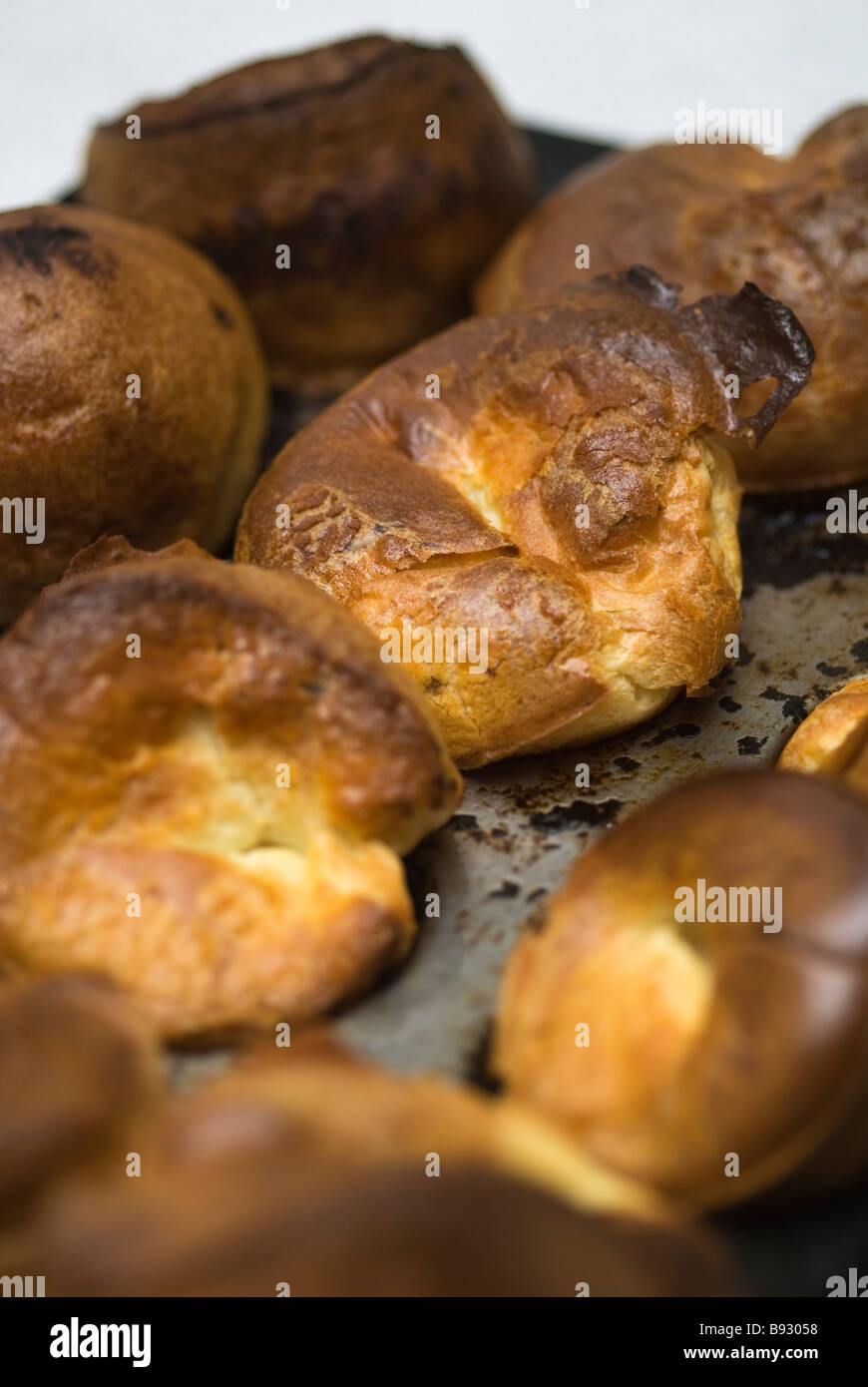 Round Yorkshire Puddings on baking tray Stock Photo - Alamy
