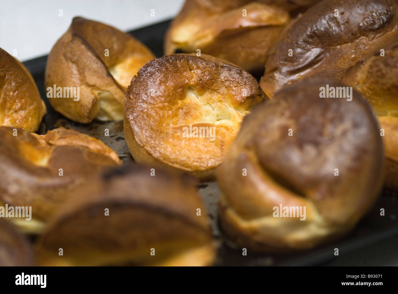 Round Yorkshire Puddings on baking tray Stock Photo - Alamy