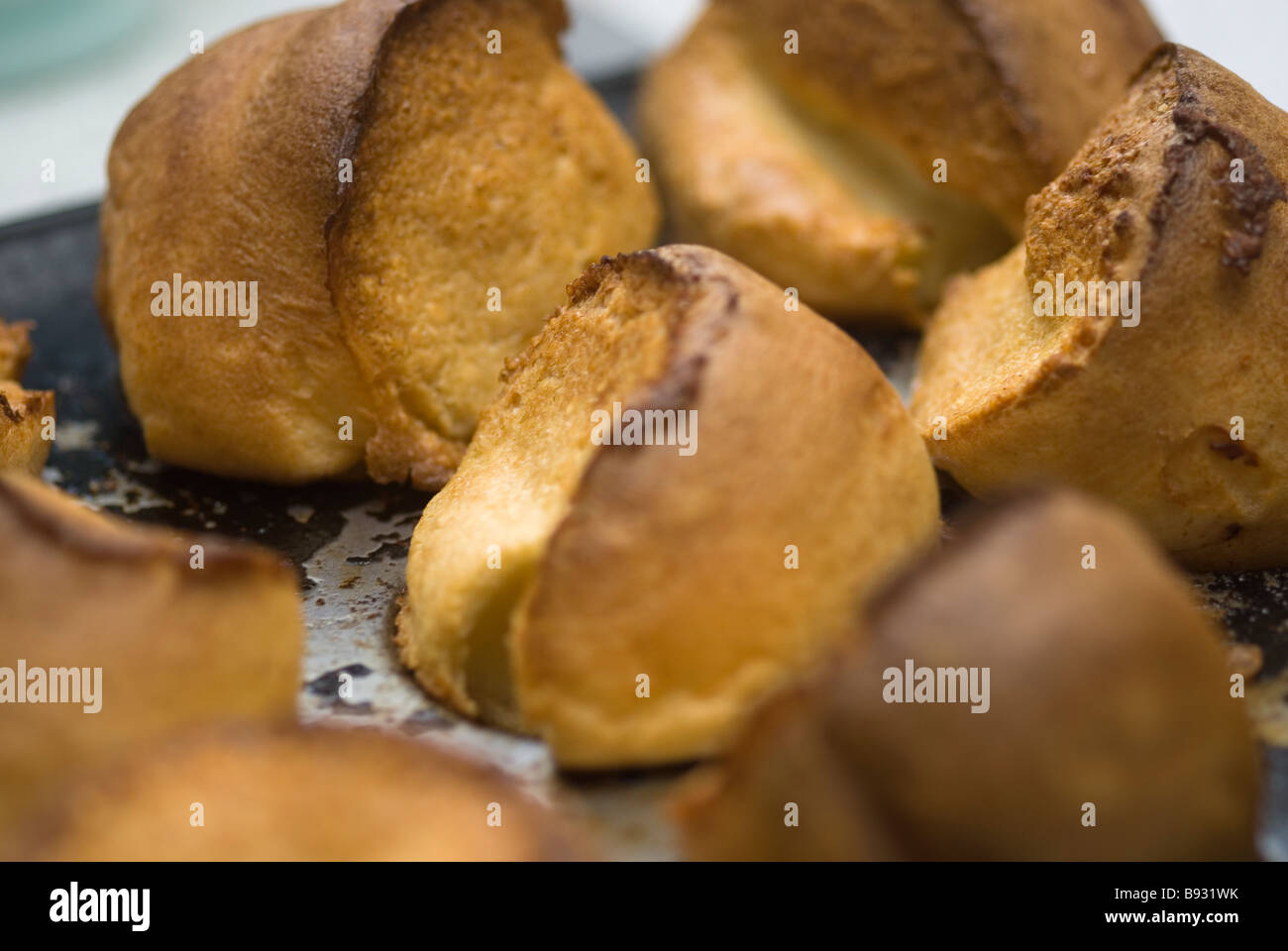 Round Yorkshire Puddings on baking tray Stock Photo - Alamy