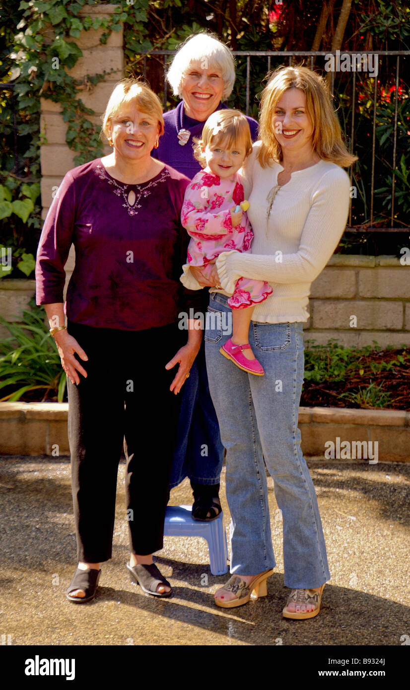 Mother Daughter Grandmother And Great Granddaughter Pose In A Southern