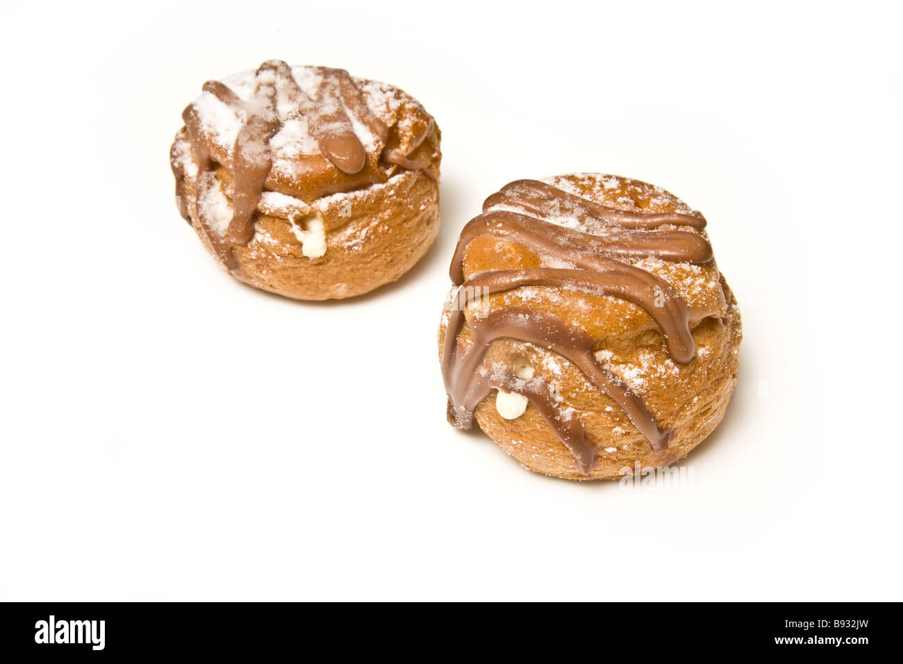 Cream buns isolated on a white studio background Stock Photo - Alamy
