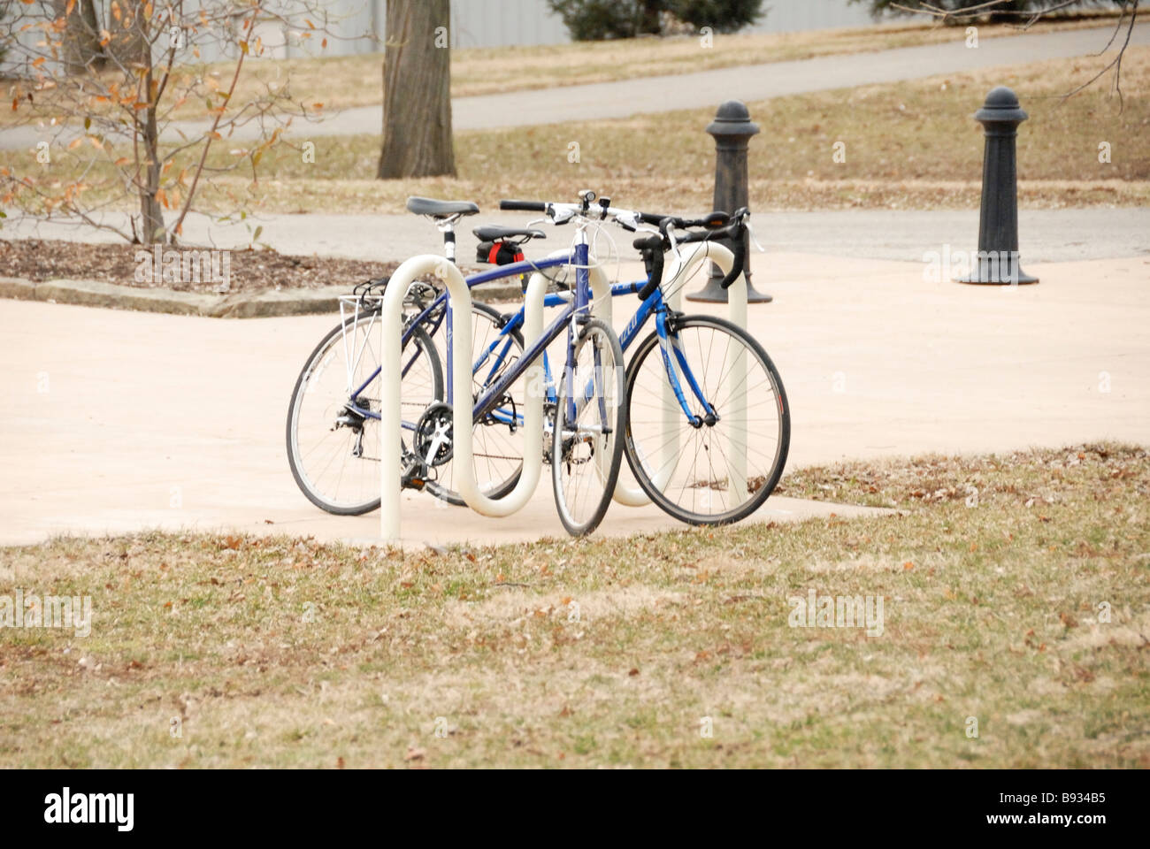 Two bicycles at park in spring Stock Photo - Alamy