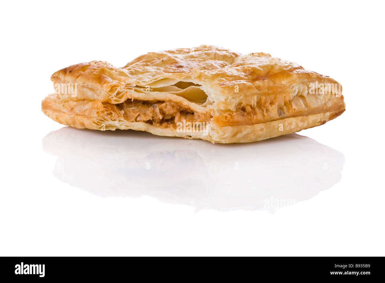 Puff pastry with tuna and tomato stuffing isolated on white background ...