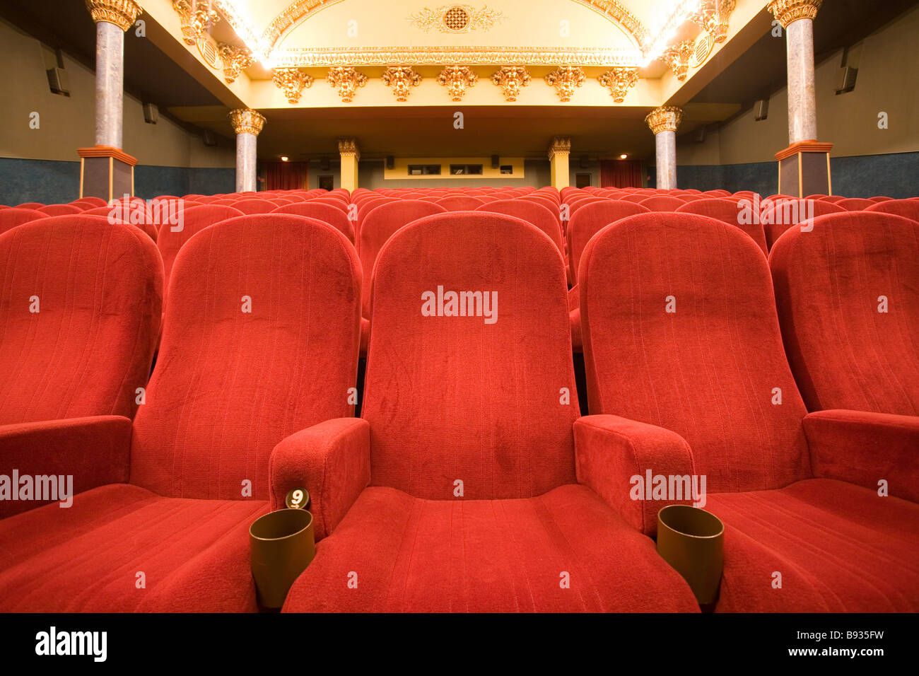 chairs in an empty cinema auditorium Stock Photo - Alamy