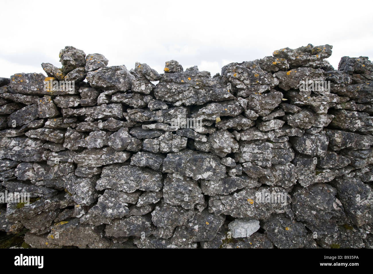 Dry stone wall made from limestone pavement, showing interlocking large ...