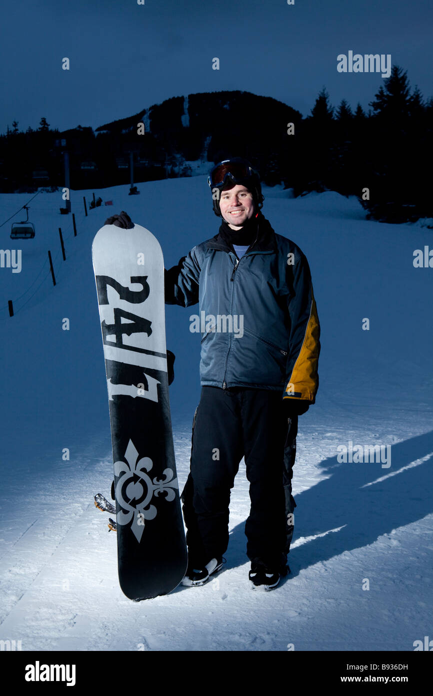 Snowboarder, male, thirties photographed on Whistler mountain, Canada ...