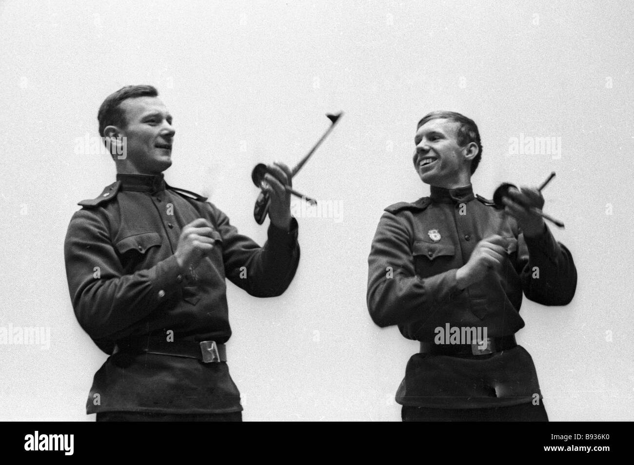 Amateur army ensemble plays spoon music Stock Photo - Alamy