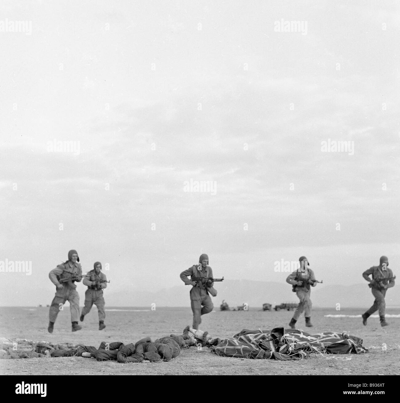 Armed paratroopers of the Lenin Komsomol higher aviation school ...