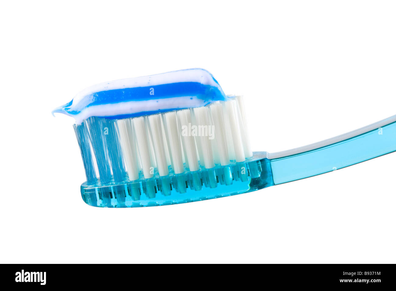 Toothpaste on a toothbrush Stock Photo - Alamy
