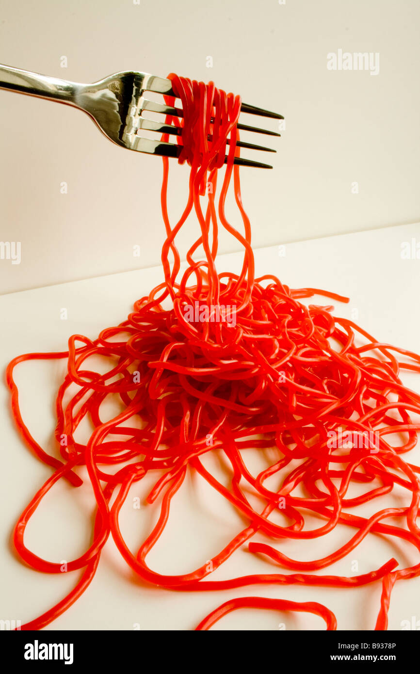 Red Spaghetti - aka strawberry shoelaces ! Stock Photo - Alamy
