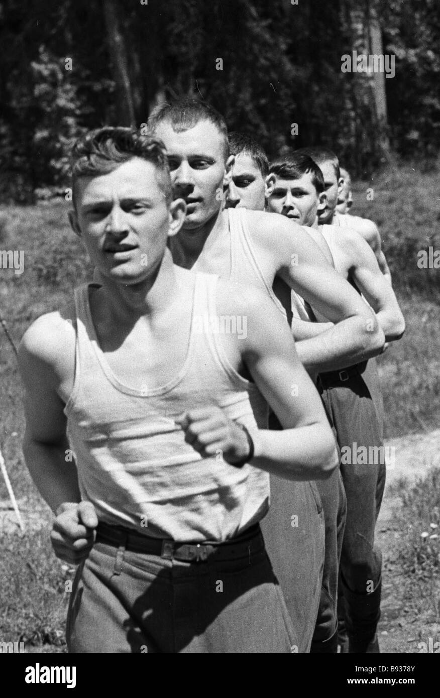 Soldiers doing their morning jog in the woods Stock Photo - Alamy