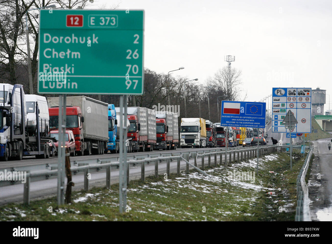 A line of loaded trucks waiting for customs clearance at Dorohust on ...